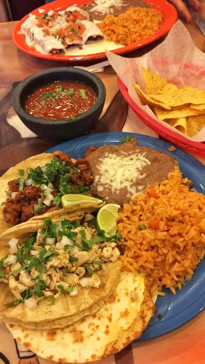 The holy trinity of Mexican dining: perfectly seasoned rice, beans that weren't an afterthought, and enchiladas that make you question all previous enchilada experiences.