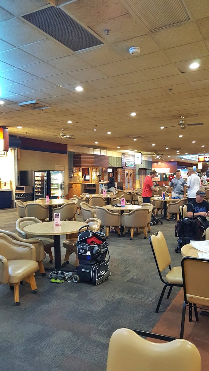 Where strangers become lane-mates and everyone's bowling technique gets a friendly, unsolicited critique from fellow players.