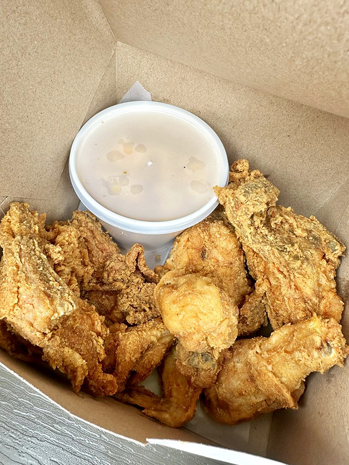 When chicken and gravy join forces, resistance is futile. This to-go box contains more joy than most people experience in a week.