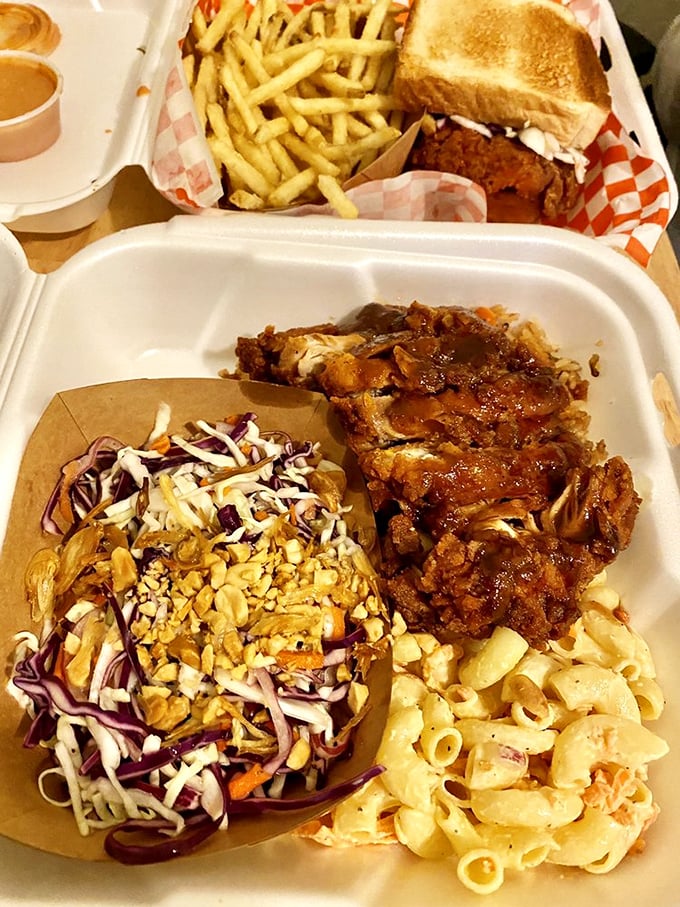 This isn't just lunch, it's an architectural marvel &ndash; layers of flavor built on a foundation of perfect mac salad and crowned with saucy chicken glory.