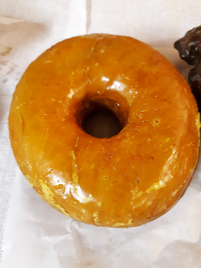 Glistening with amber glaze that captures light like stained glass, this golden beauty reminds us why the classics never go out of style.