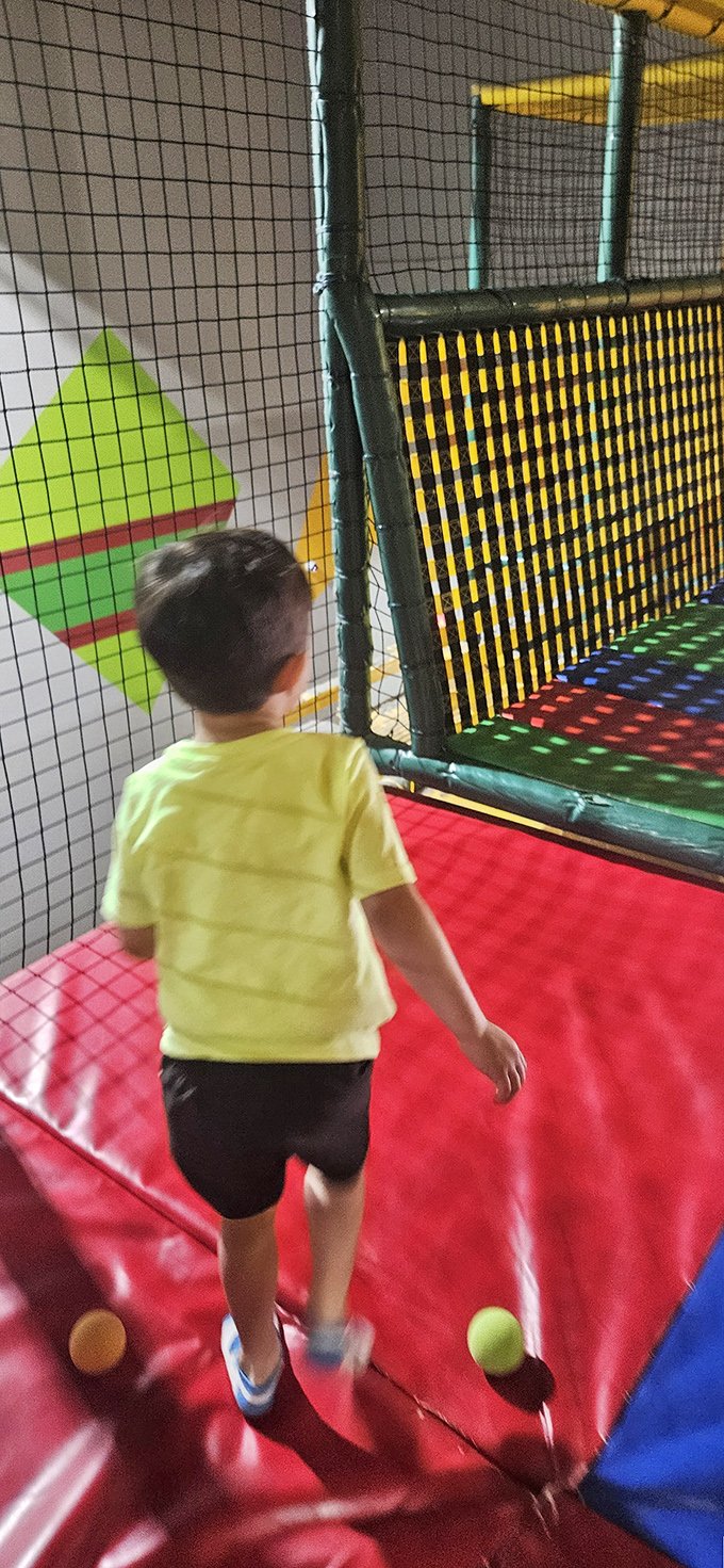 A youngster navigates the trampoline zone&mdash;that magical place where gravity takes a coffee break and kids burn limitless energy.