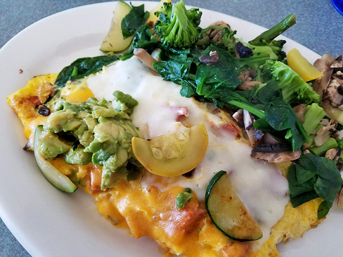 Mother Nature's garden party wrapped in eggs. The avocado isn't just a topping&mdash;it's making a statement about California living.