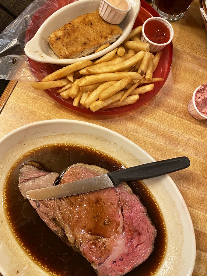 The knife slicing through this prime rib meets less resistance than a politician accepting a campaign donation. Pure beefy bliss.