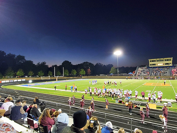 Friday night lights in Saugatuck—where high school football isn't just a game but a community celebration bringing together generations of local families.