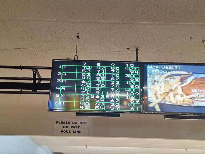 The digital scoreboard tells tales of triumph and gutter balls alike&mdash;where numbers don't lie but sometimes offer comic relief.