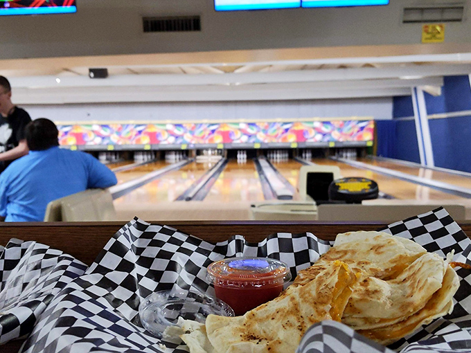 Nothing complements the satisfying crack of falling pins like these quesadillas served in checkered paper&mdash;bowling alley cuisine at its unpretentious finest.