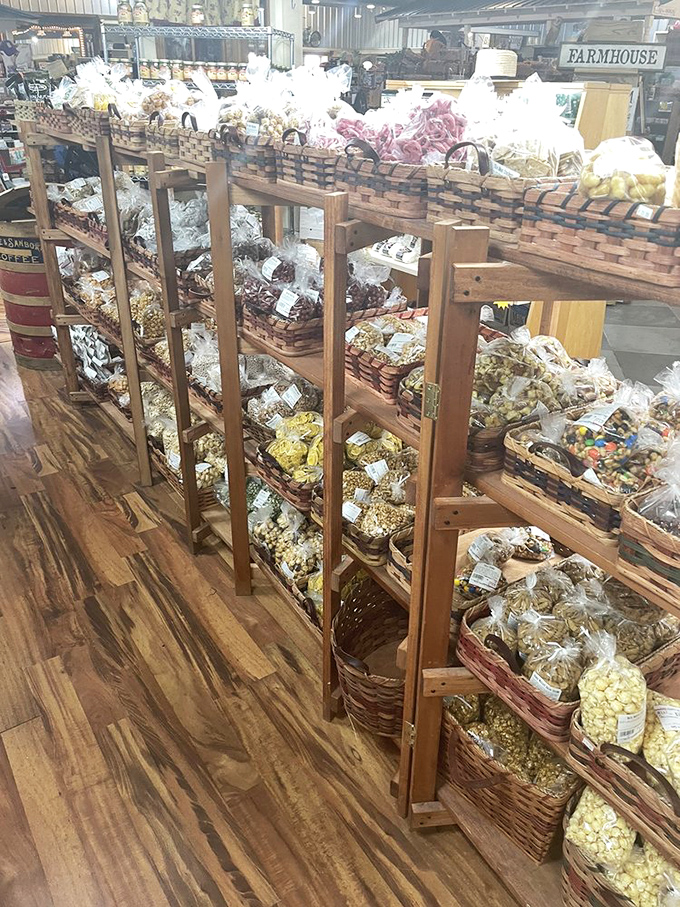 Snack heaven organized in handcrafted wooden shelving. Like a library of deliciousness where calories don't count because they're "artisanal."