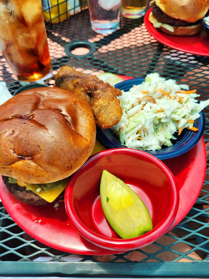 Even the veggie options demand respect here. This burger with crispy sides proves that meatless doesn't mean joyless in the hands of skilled cooks.