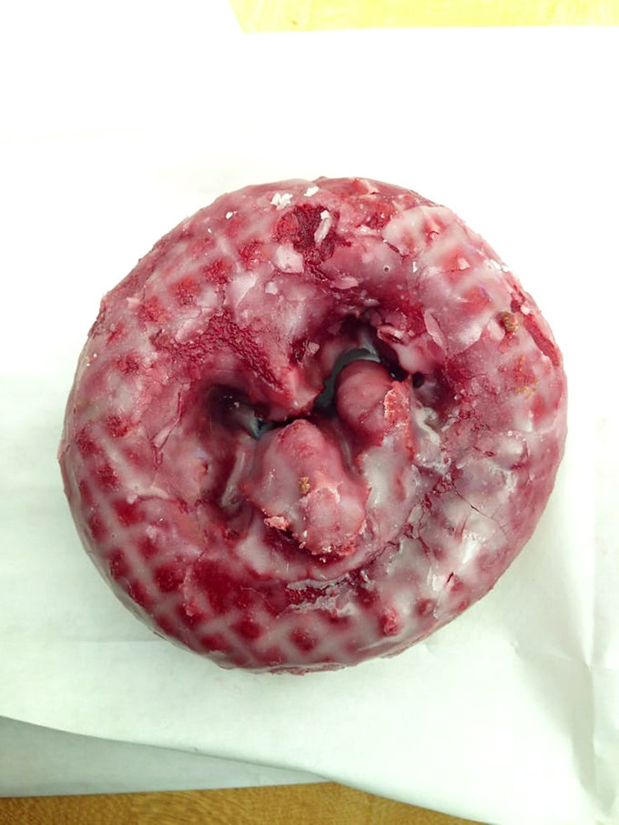 This red velvet donut isn't just a treat; it's wearing evening attire for your taste buds' most elegant party.