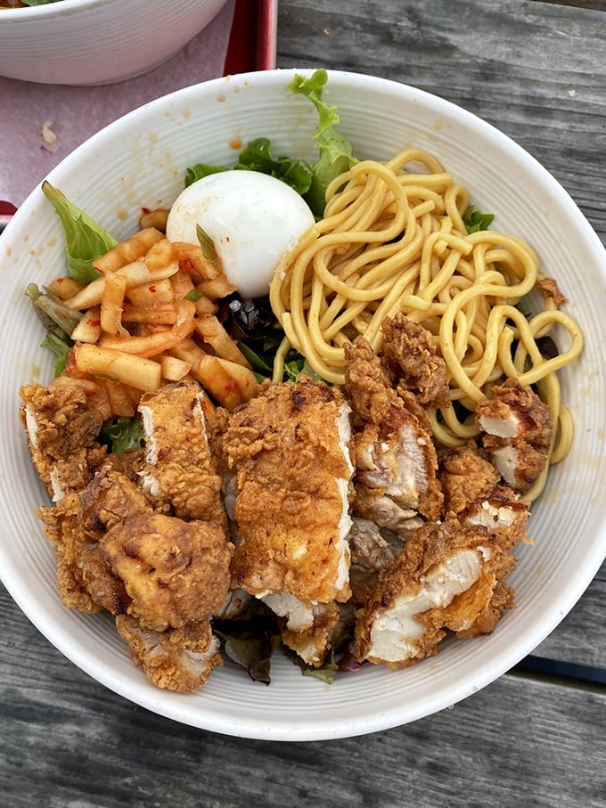 A salad that proves vegetables can hang with the cool kids. That soft egg is the silent hero of this bowl.