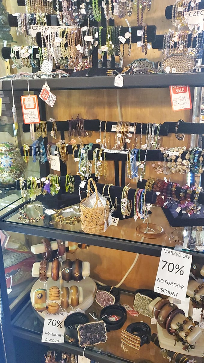 Cowboy culture collides with southwestern style in this booth. Those fringe leather jackets aren't just clothing&mdash;they're wearable American mythology waiting for their next chapter.