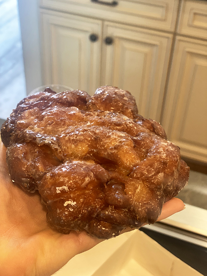 The apple fritter&mdash;a glorious, misshapen monument to excess. Each craggy peak and valley captures glaze in ways that should be studied by scientists.