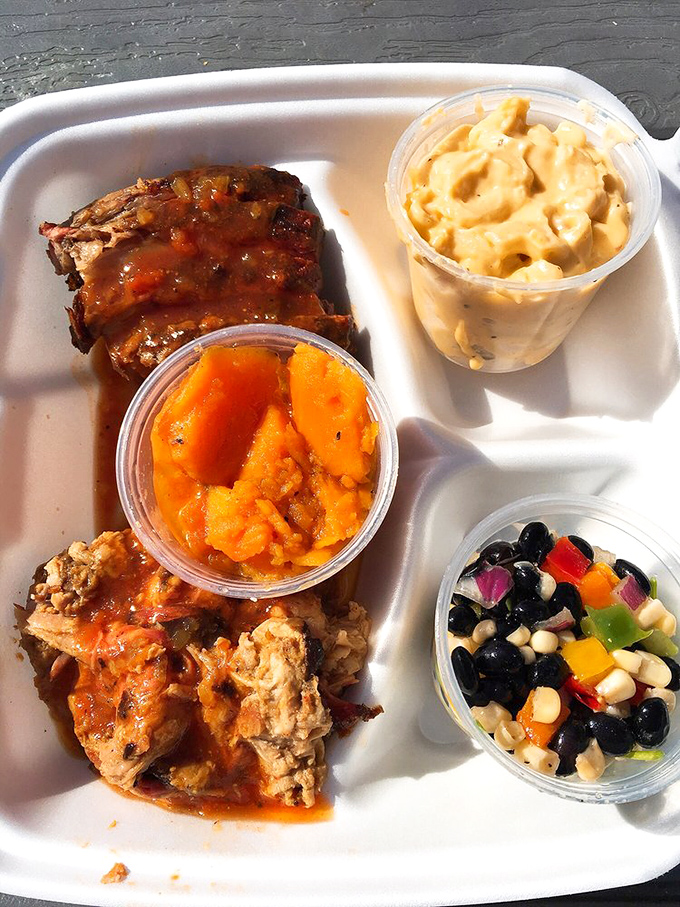 When your plate requires its own zip code, you know you're doing BBQ right. This spread isn't a meal&mdash;it's a celebration.