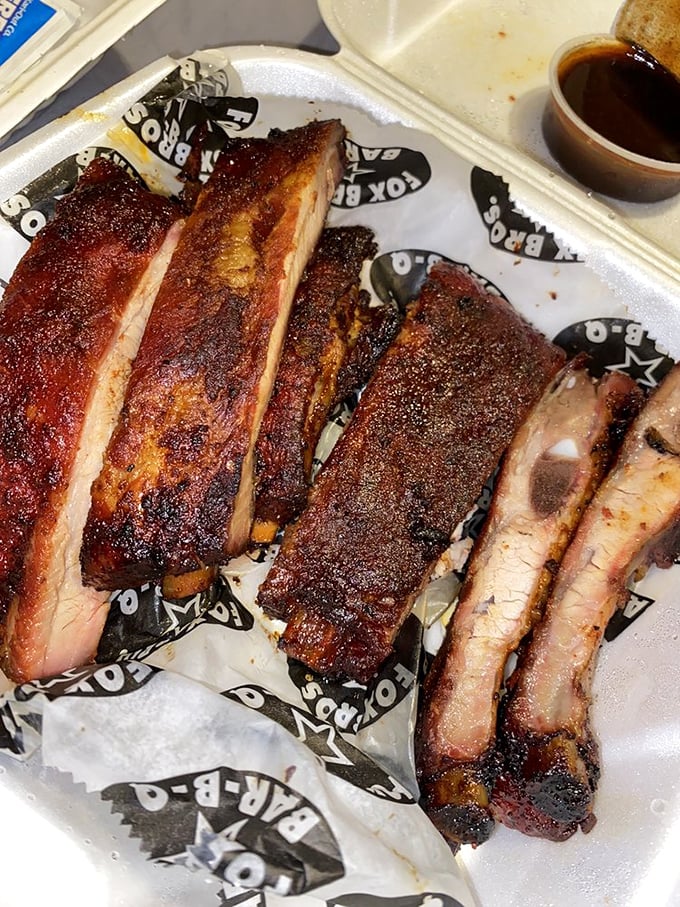 Even in a to-go container, these ribs maintain their dignity and promise&mdash;the barbecue equivalent of formal wear.