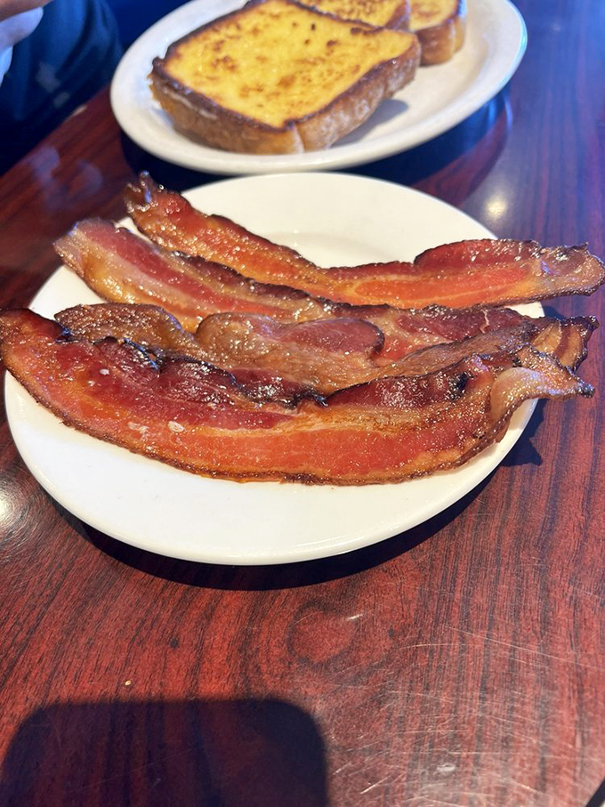 Bacon so perfectly rendered it should have its own Instagram account. Crisp edges, savory middle&mdash;breakfast's undefeated heavyweight champion.