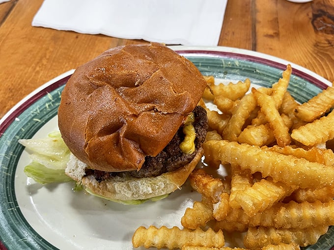 A burger that doesn't need Instagram filters &ndash; just honest beef, melted cheese, and those crinkle-cut fries that transport you straight back to childhood.