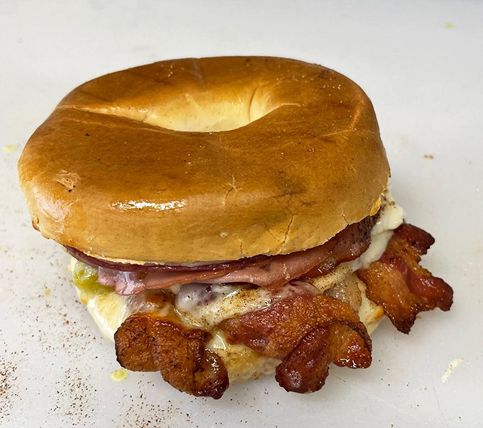 This isn't just a breakfast sandwich&mdash;it's morning architecture. Perfectly toasted bagel supporting an ambitious coalition of eggs, meat and cheese.