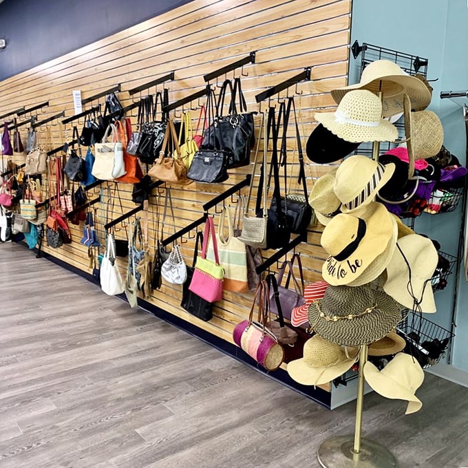 Handbag heaven exists in Cary! This impressive display wall features purses and summer hats for every occasion from boardroom meetings to beach getaways.