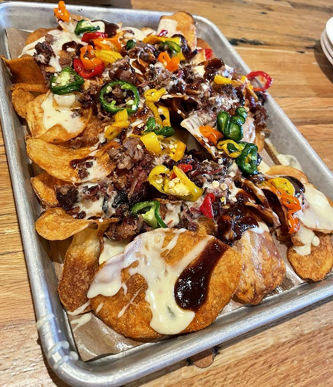 Nachos reimagined as a barbecue delivery system. Whoever first put brisket on chips deserves a Nobel Prize in Deliciousness.