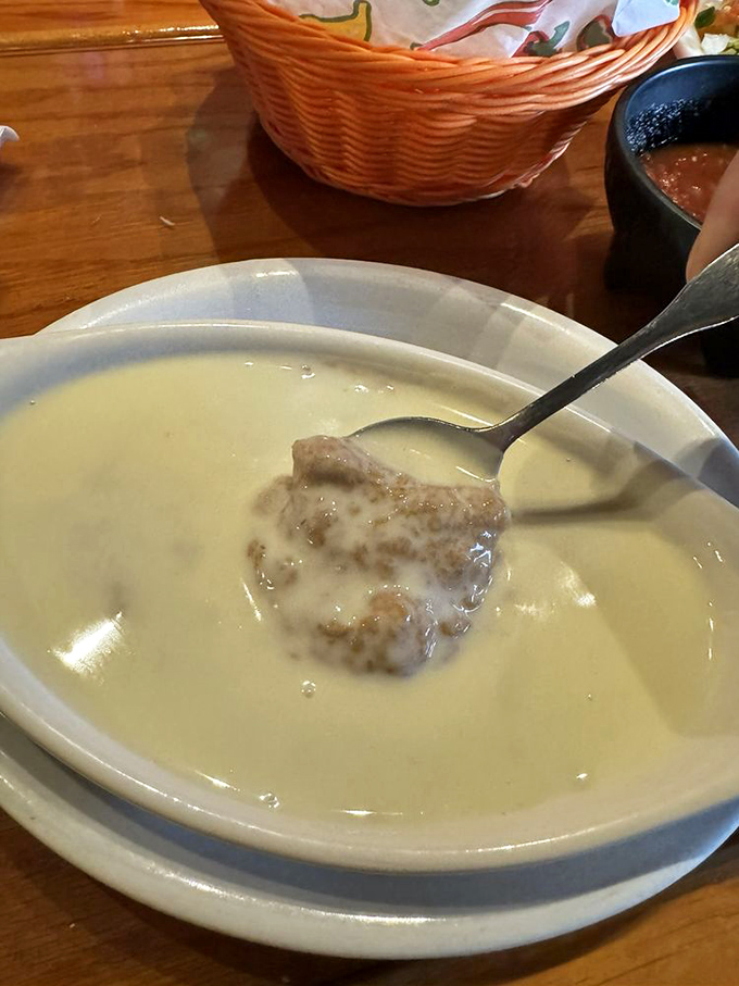 This queso dip might look innocent enough, but one bite and you'll understand why people drive across county lines just for a taste.