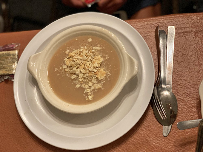 Bean soup that could make a vegetable-hater reconsider life choices. Topped with crumbled crackers, it's comfort in a bowl.
