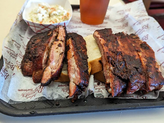 When ribs and fries share a metal tray, it's not just lunch&mdash;it's a balanced diet according to Kansas City's food pyramid.