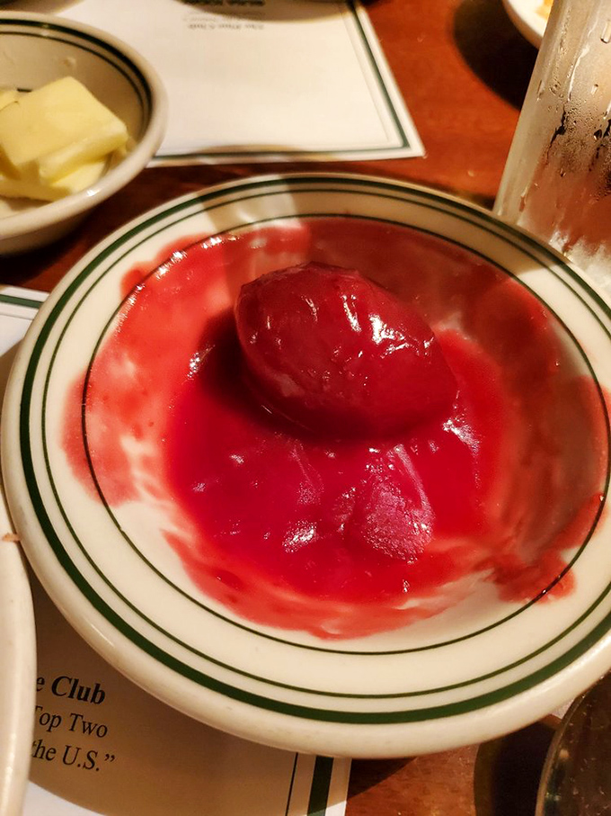The stewed tomatoes glow ruby-red in their dish. This signature side has converted even the most devoted tomato skeptics.