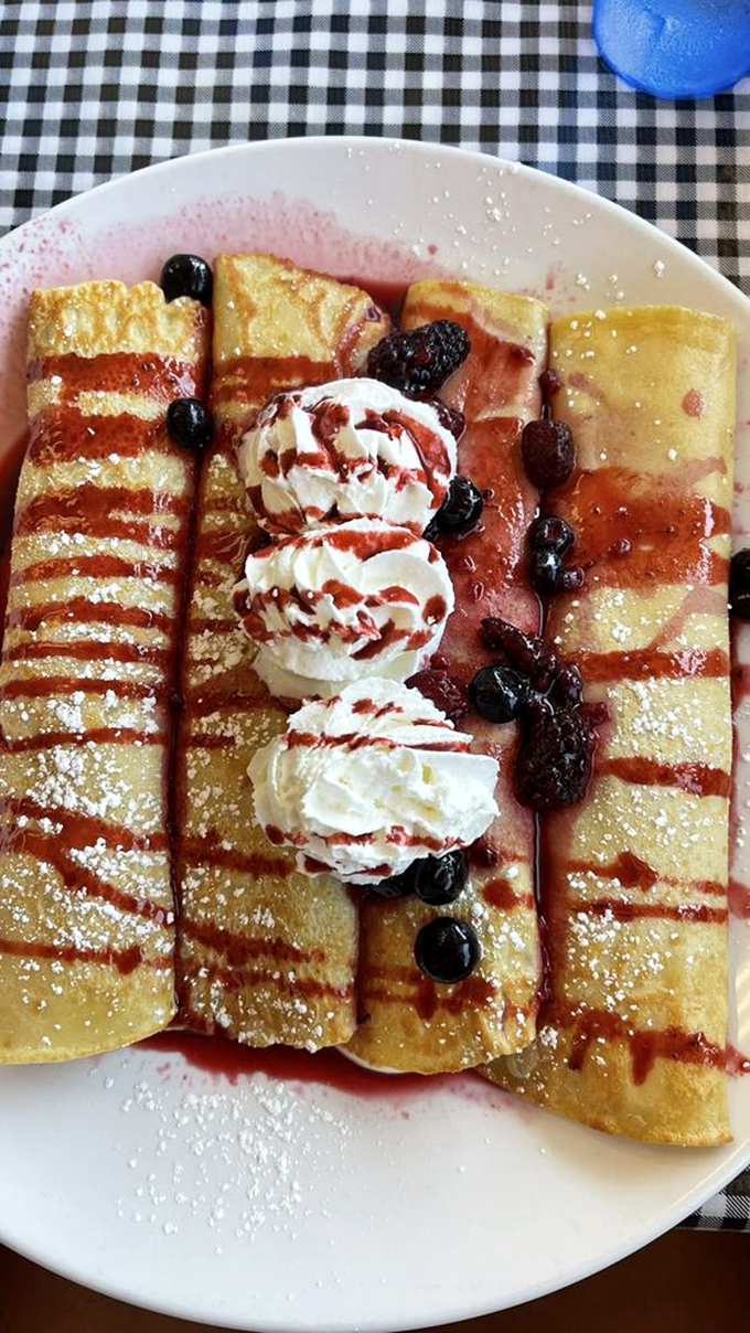 These crepes aren't just breakfast, they're dessert with an alibi. Berry-filled perfection that makes you feel both naughty and nice.