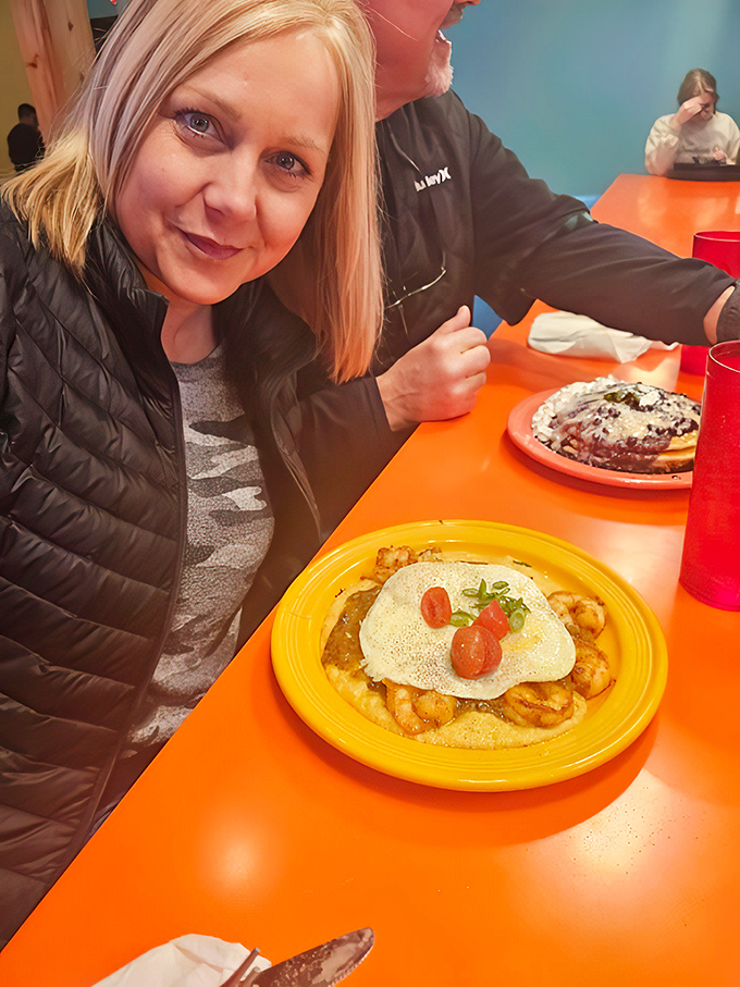 That perfect moment when the egg yolk meets the shrimp and grits creates a breakfast m&eacute;nage &agrave; trois that would make Julia Child blush with delight.