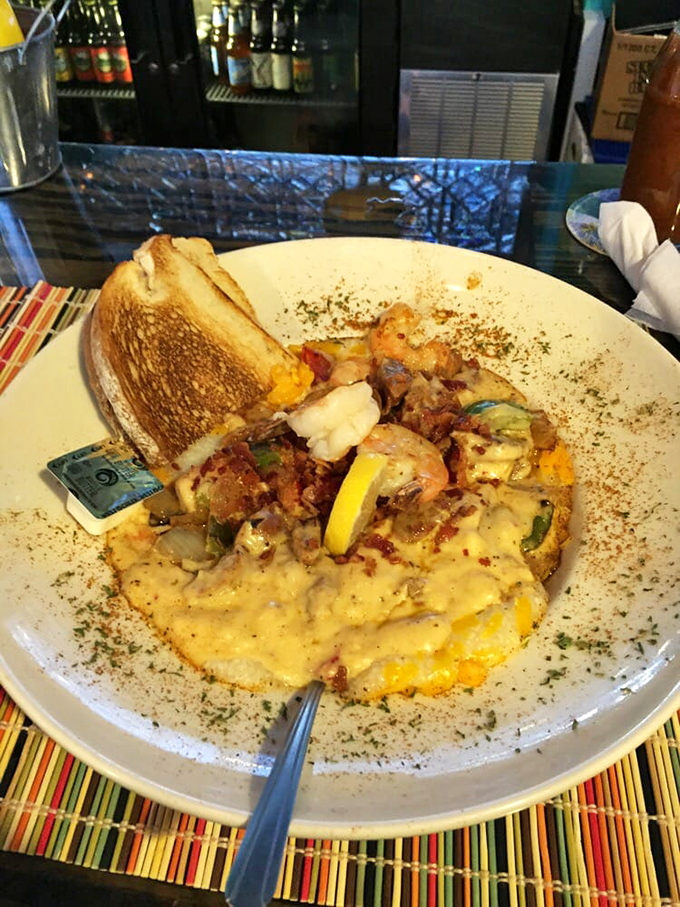 The perfect bite: tender shrimp, creamy grits, and that magnificent sauce. Some Virginia Beach locals admit they dream about this dish. Who could blame them?