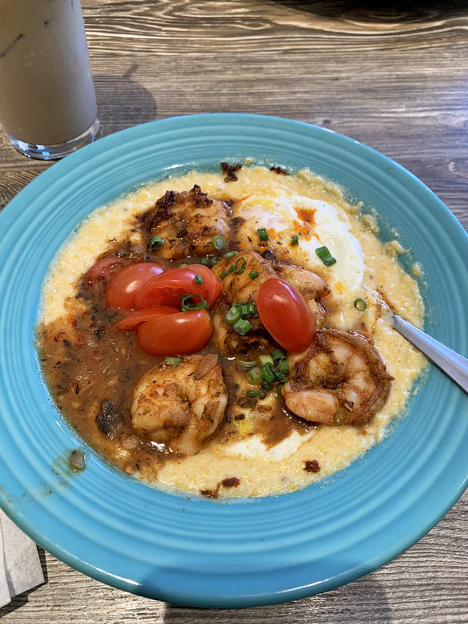 Whoever said breakfast should be boring never met these shrimp, lounging in their creamy grits like they're at a five-star resort.