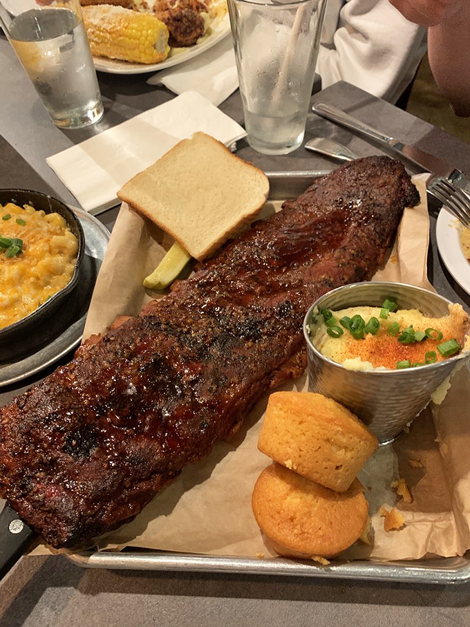 That perfect BBQ tray &ndash; where the ribs are the headliner, but the sides deserve their own standing ovation. The bread is there for structural support (and sauce mopping).