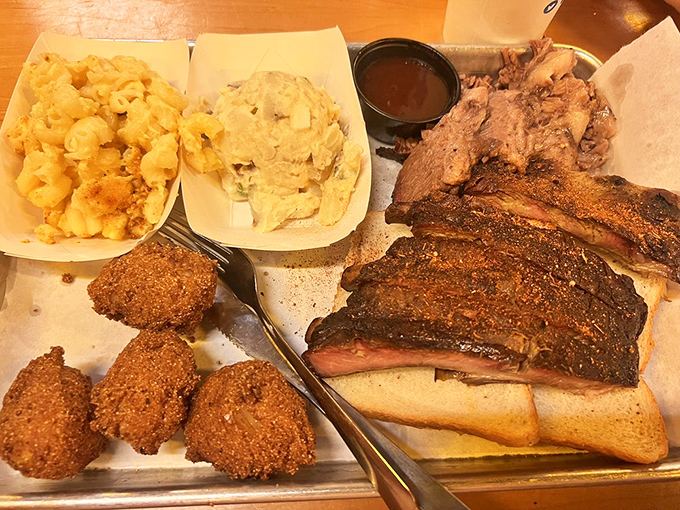 A barbecue feast fit for royalty, served on an unpretentious metal tray &ndash; because paper plates would surrender under this magnificent weight.