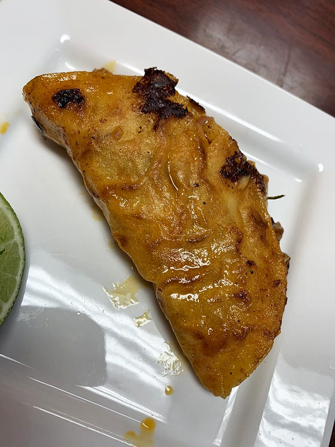 That golden-fried quesadilla glistens with promise, like the first sunny day after winter. One bite and you'll understand why cheese is its own food group.