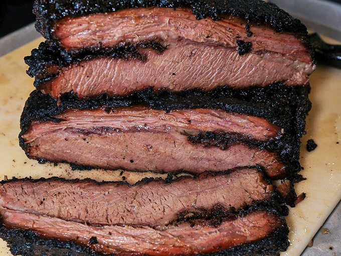 This sliced brisket tells a story of time, smoke, and patience&mdash;each layer revealing the barbecue master's dedication to the craft.