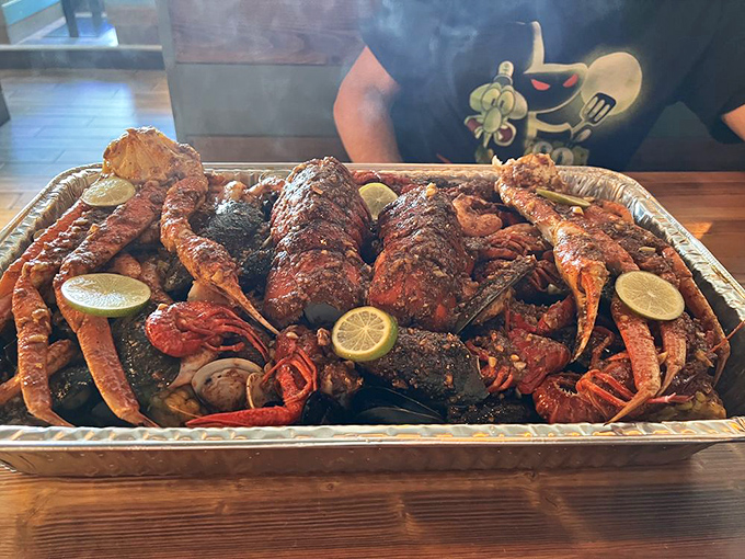 The seafood boil in all its glory: a magnificent mess of shellfish that makes you forget you're 700 miles from the nearest coastline.