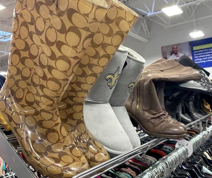 Designer boots mingling with everyday footwear—fashion democracy at its finest, where Coach and Target share the same shelf space.