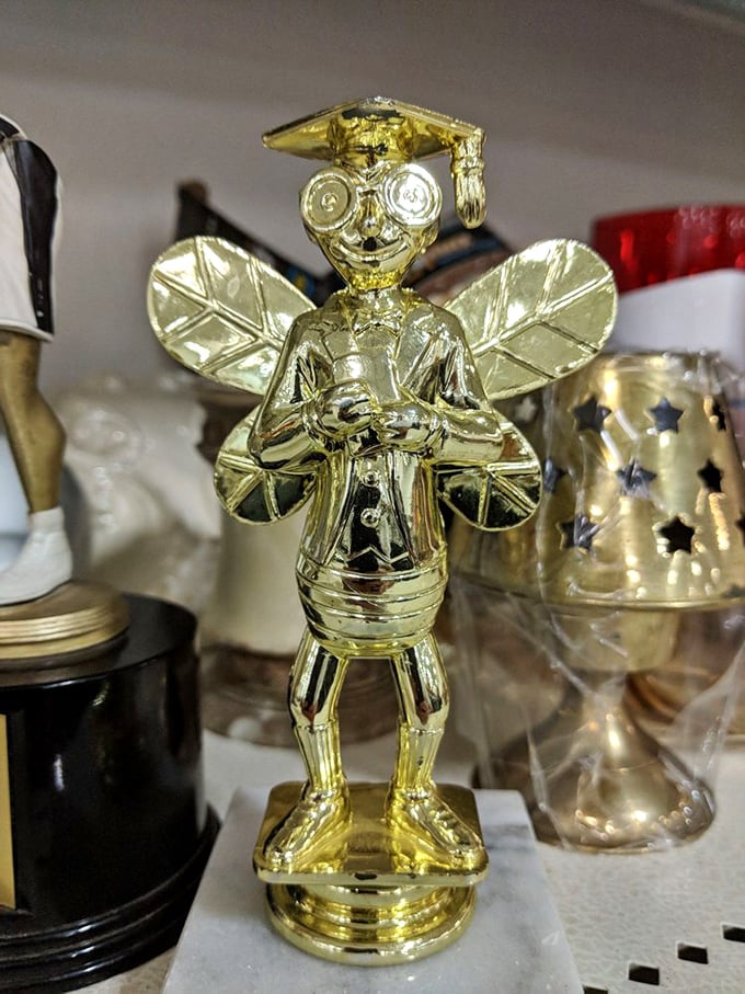 This brass graduation angel is exactly the kind of wonderfully weird tchotchke that makes thrift store hunting an addictive sport.