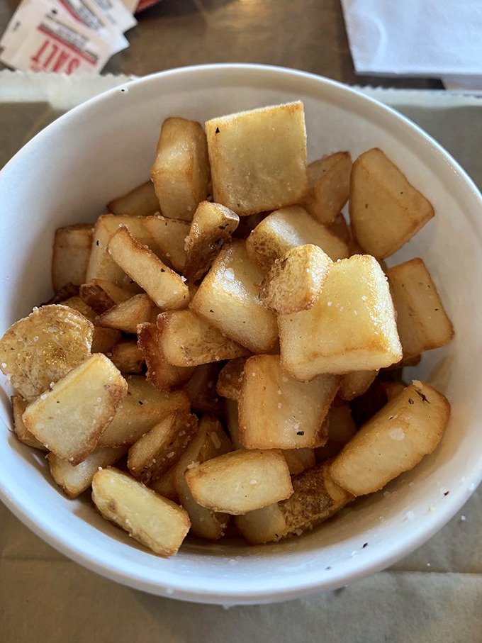 These aren't just breakfast potatoes; they're little golden cubes of morning joy, seasoned to perfection and ready for their close-up.