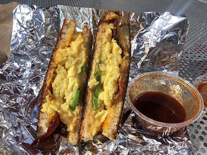 Simple paper wrapping that says, "I'm confident enough in my contents not to need fancy packaging." The sandwich equivalent of Robert Redford in a plain white t-shirt.