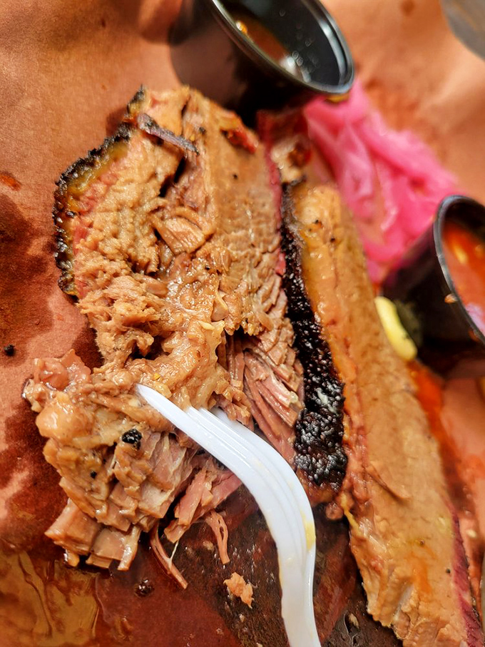 Behold the money shot&mdash;tender, juicy brisket with that signature pink smoke ring. This is what barbecue dreams are made of.