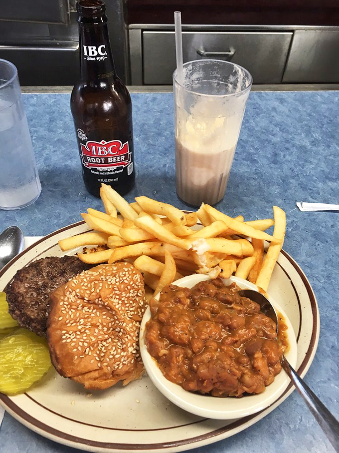 The Mickey's Special in its natural habitat: a sesame-flecked burger, golden fries, and those famous baked beans&mdash;comfort food's holy trinity.