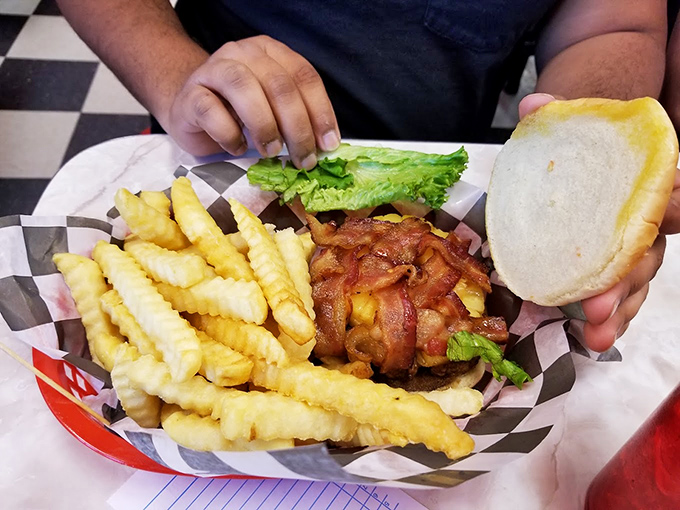 This burger's bacon blanket isn't just a topping&mdash;it's a lifestyle choice that says "today, my friend, we celebrate."
