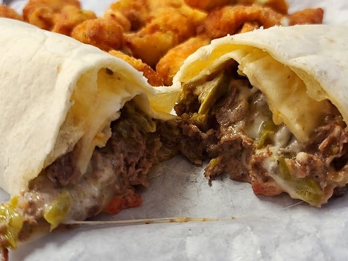 Cut into this burrito and witness the miracle of melted cheese meeting seasoned beef&mdash;a handheld feast that would make Elvis himself pull over.