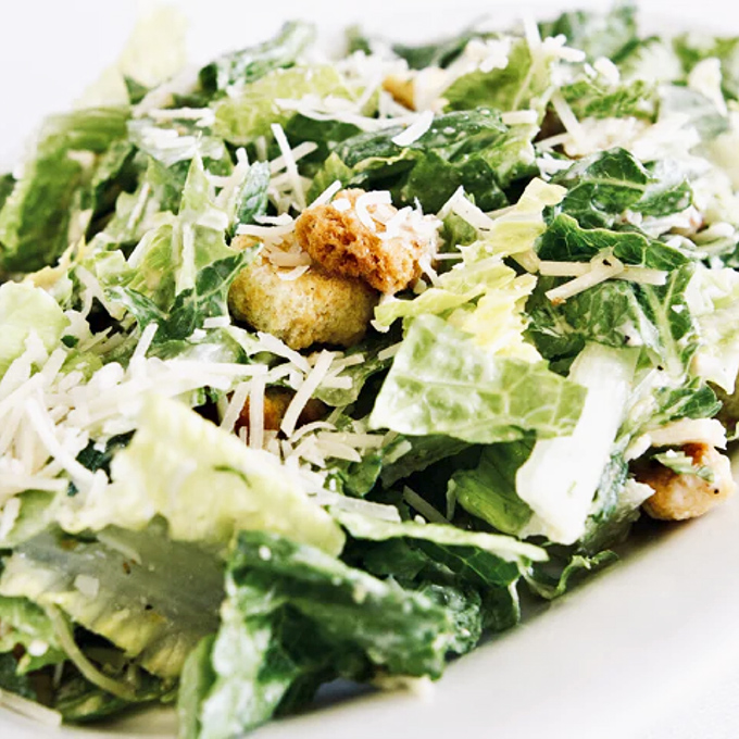 Even the Caesar salad gets the royal treatment here&mdash;crisp romaine, shaved parmesan, and house-made croutons that deserve their own fan club.