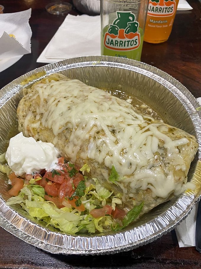 This burrito isn't just wrapped—it's embraced by a tortilla and blanketed with cheese. The kind of comfort food that gives actual comfort.