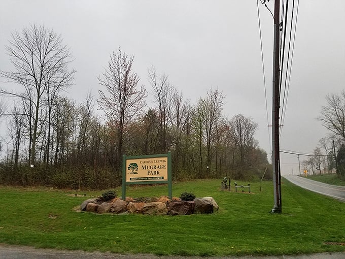 Mugrage Park's welcome sign promises the kind of outdoor escape that makes you forget you have emails waiting.