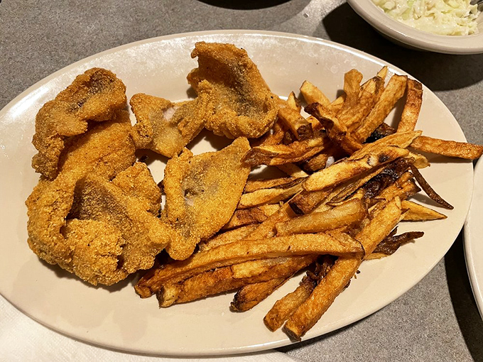 This isn't just catfish and fries&mdash;it's edible Arkansas heritage on a plate. The cornmeal crust crackles with each bite, revealing tender fish beneath.