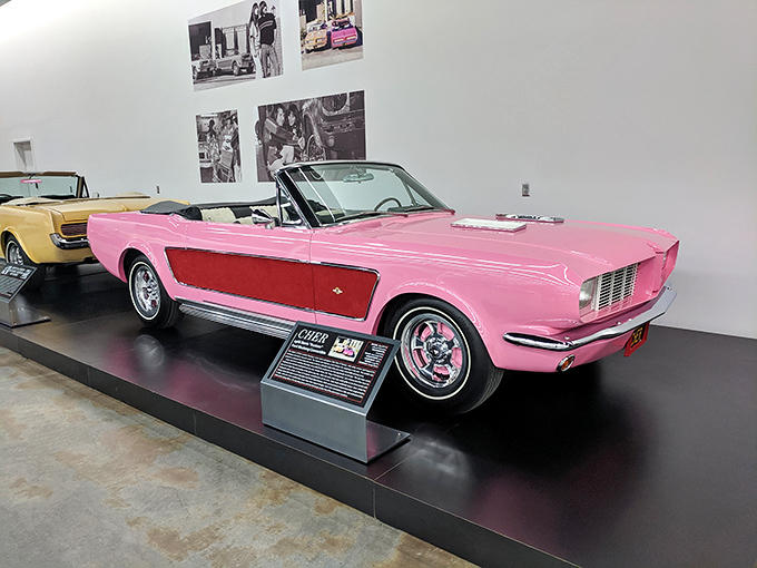 This bubblegum pink Mustang convertible isn't just transportation &ndash; it's a statement piece that screams "life's too short for boring cars!" 